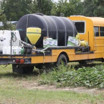 7 school buses on the farm