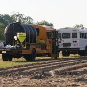 7 school buses on the farm